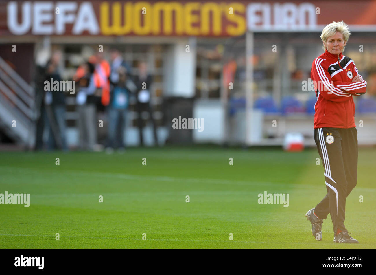 Silvia Neid, head coach of the German national soccer team, follows her ...