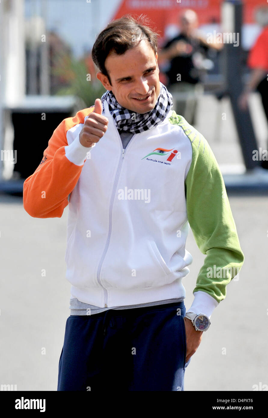 Italian Formula One driver Vitantonio Liuzzi of Force India arrives at ...