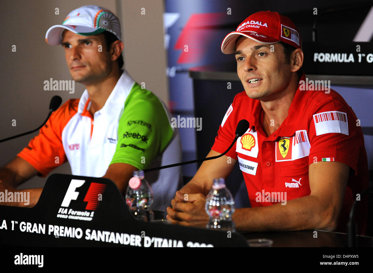 Italian Formula One driver Vitantonio Liuzzi of Force India (L) and ...