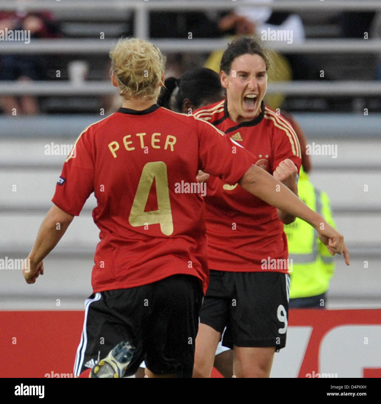 Germany?s Birgit Prinz (R) celebrates scoring the 1-0 during the UEFA ...