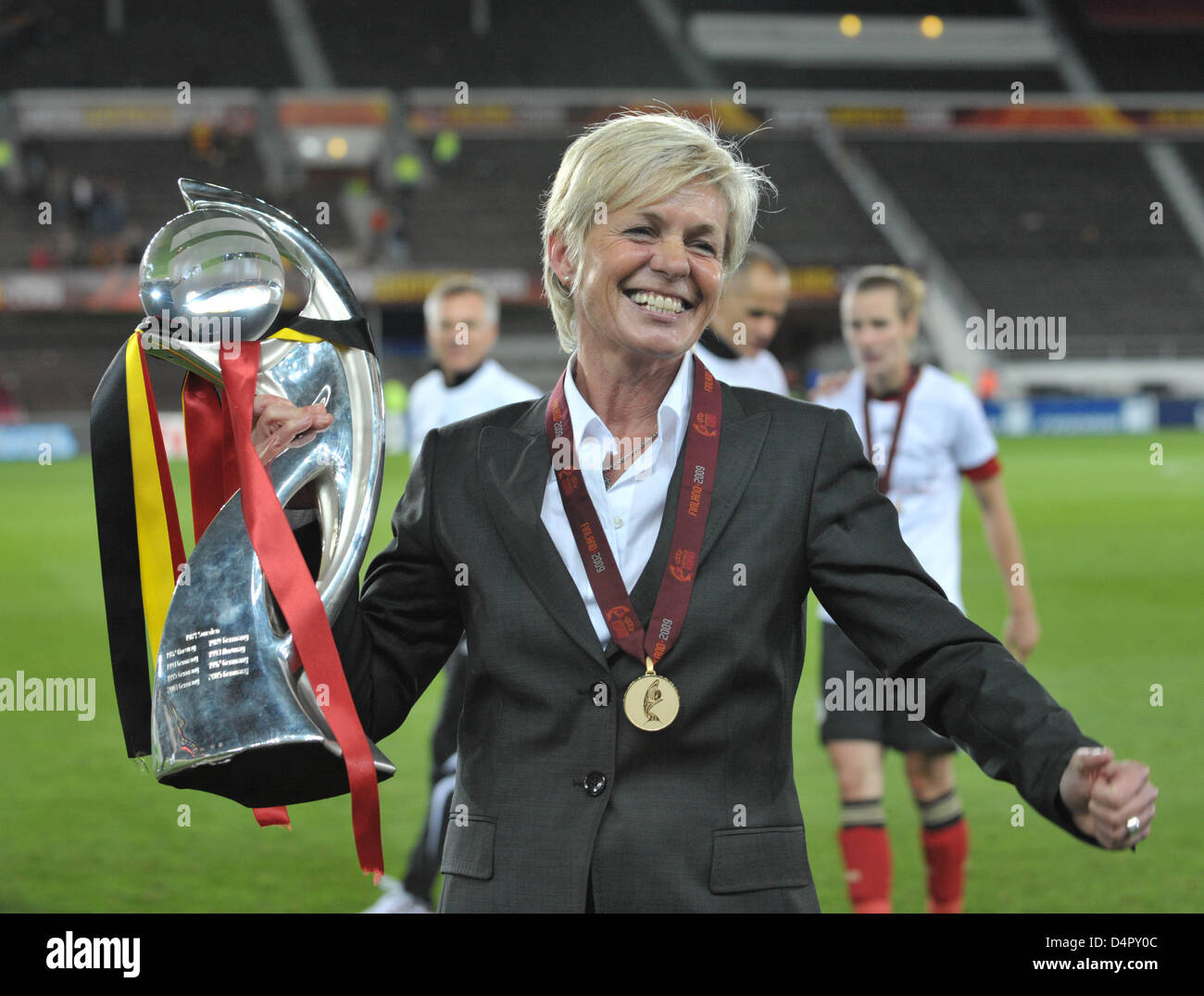 Germany?s head coach Silvia Neid poses with the cup after the UEFA ...