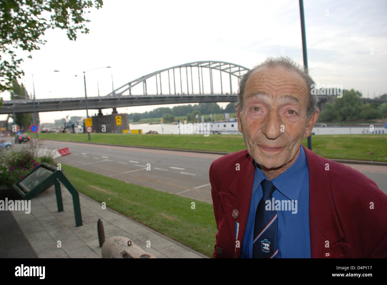 Dutch guide to the city Sam Rubens stands in front of the bridge of ...