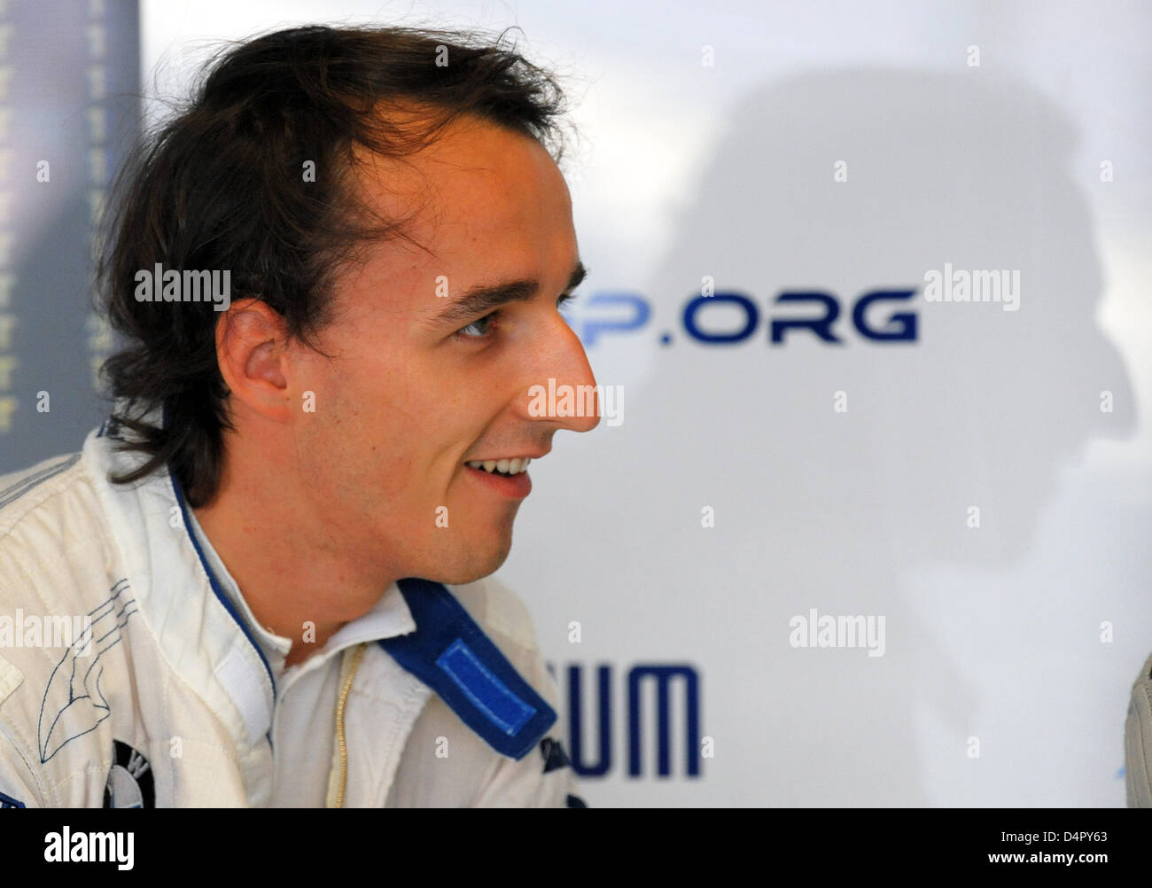 Polish Formula One driver Robert Kubica of BMW Sauber smiles in the ...