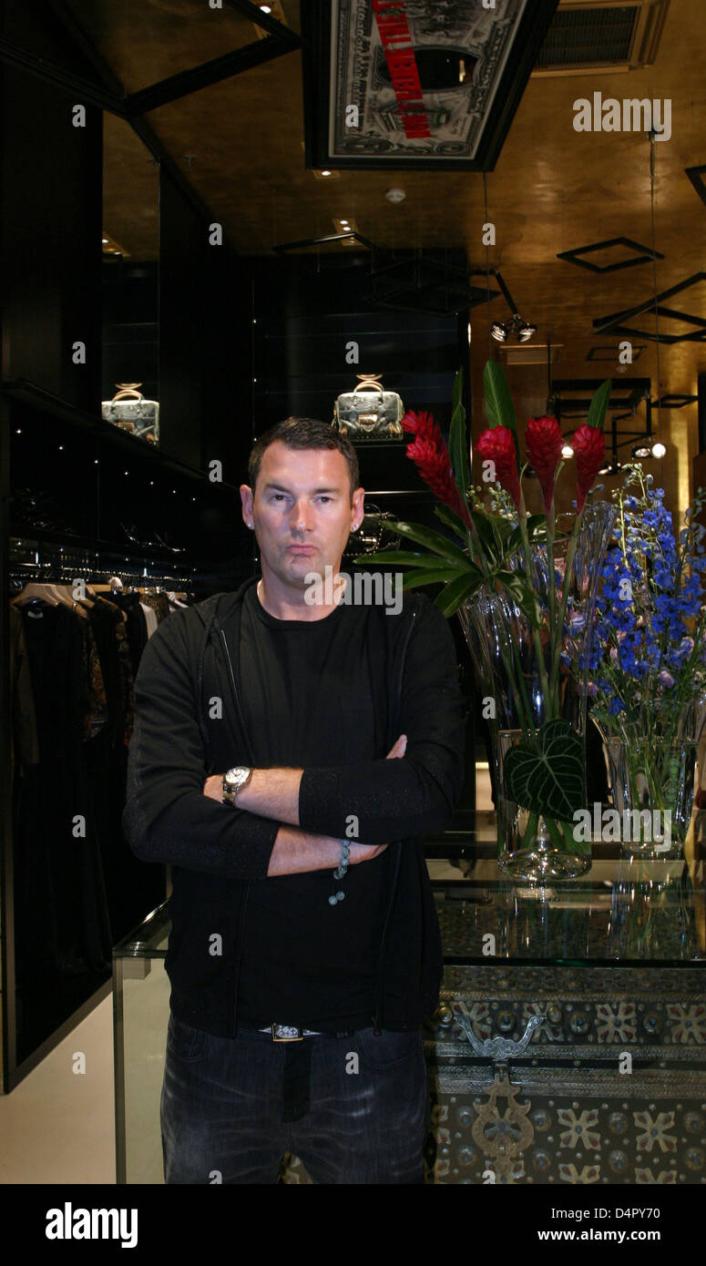 German fashion designer Michael Michalsky poses inside his new boutique ...