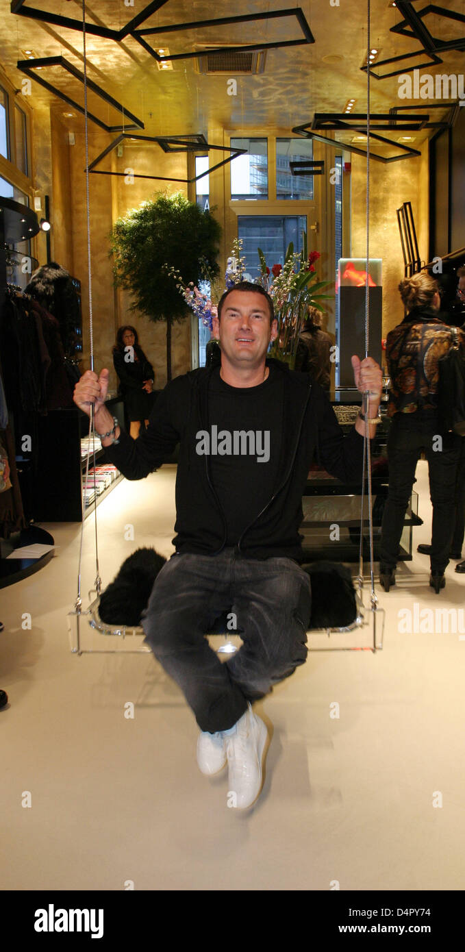 German fashion designer Michael Michalsky poses inside his new boutique ...