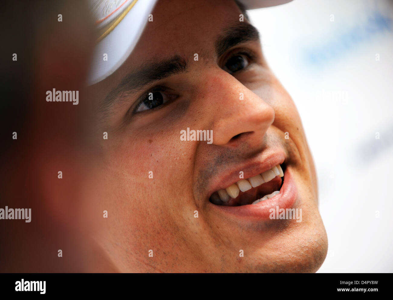 German Formula One driver Adrian Sutil of Force India smiles in the ...