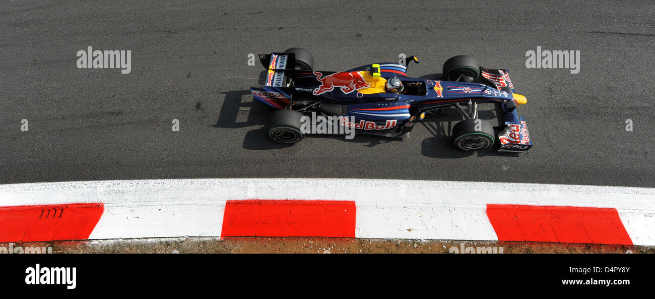 German Formula One driver Sebastian Vettel of Red Bull Racing comes ...