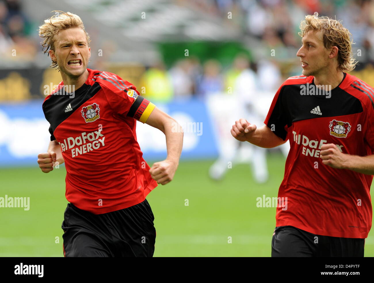 Leverkusen?s Simon Rolfes (L) celebrates his 0-2 during the German ...