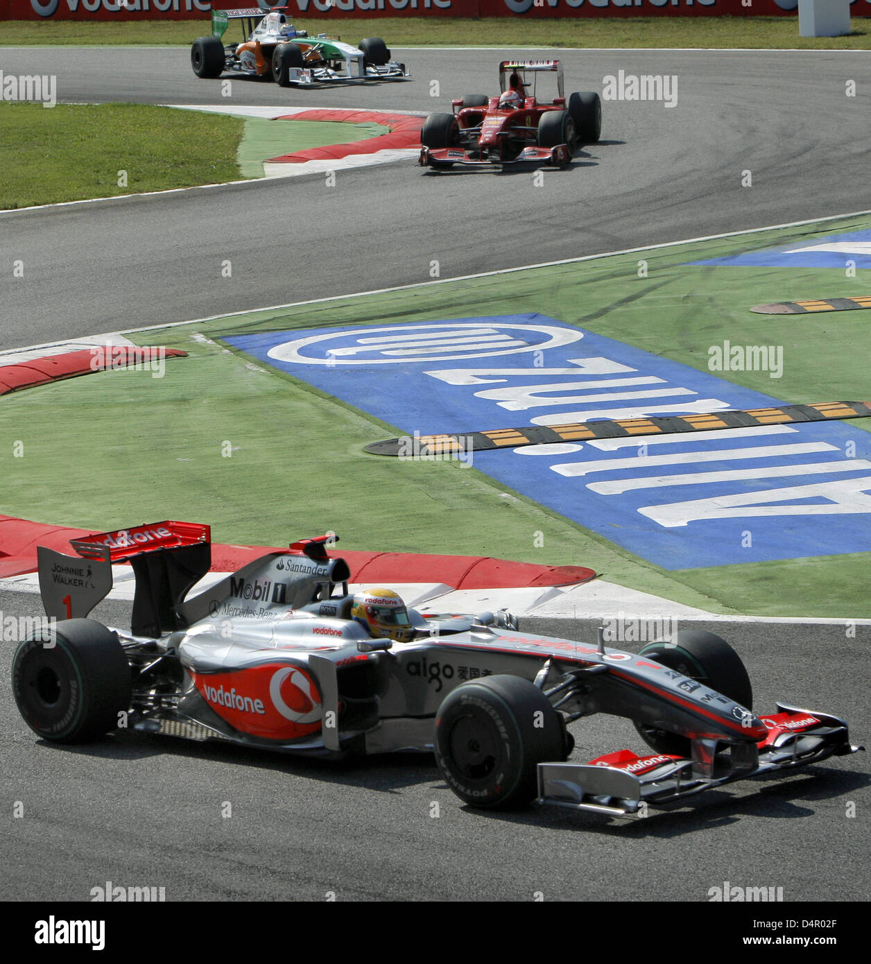 British Lewis Hamilton of McLaren Mercedes steers his car in front of ...