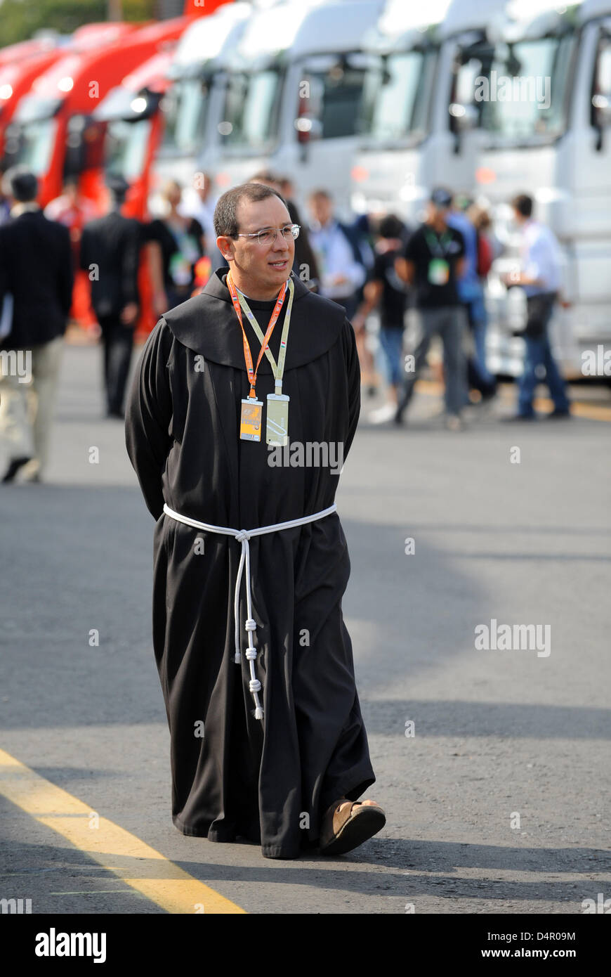 A monk walks through the paddock of Parco di Monza ractrack in Monza ...