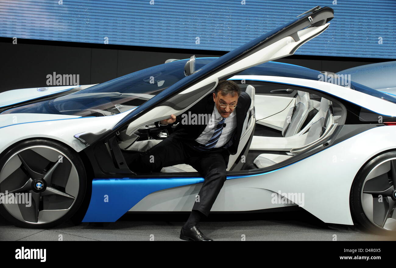 BMW CEO Norbert Reithofer poses in a BMW Vision ahead of the upcoming ...