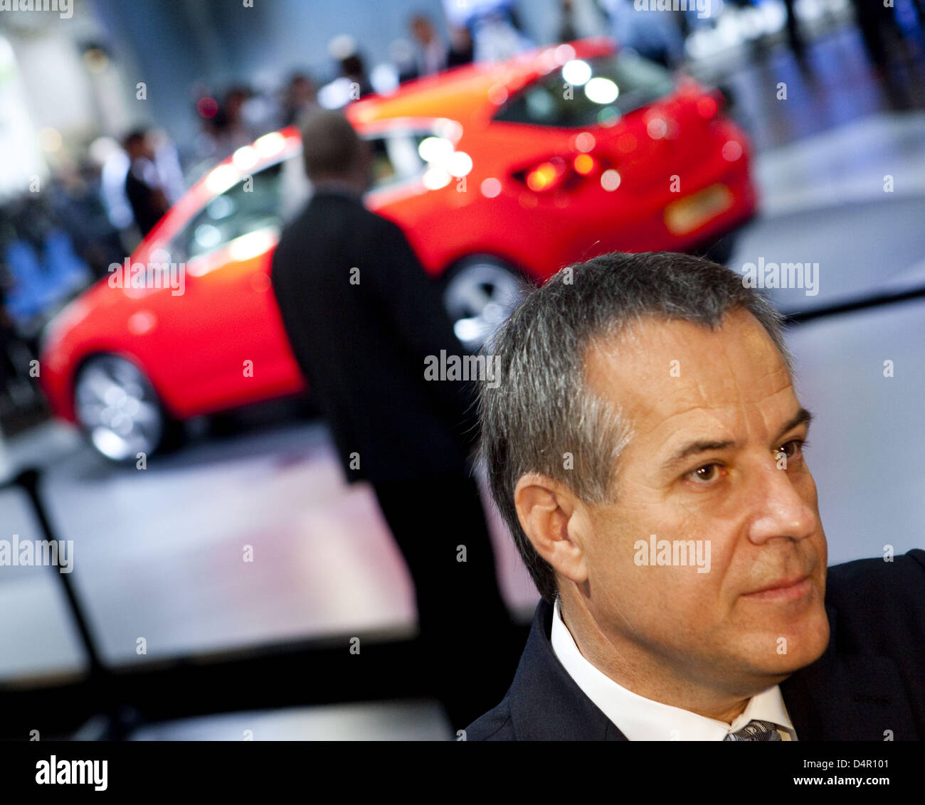 Siegfried Wolf, Co-CEO of future Opel owner Magna, smiles in front of ...