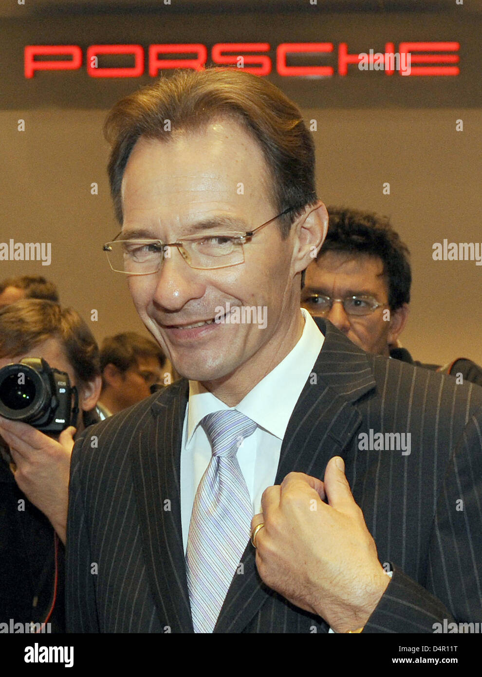 Porsche CEO Michael Macht smiles ahead of the upcoming Frankfurt Motor ...