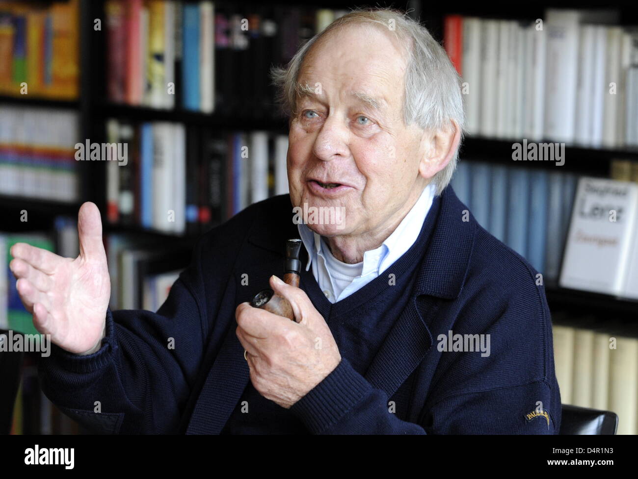 Author Sigfried Lenz smokes his pipe during an interview in Hamburg ...