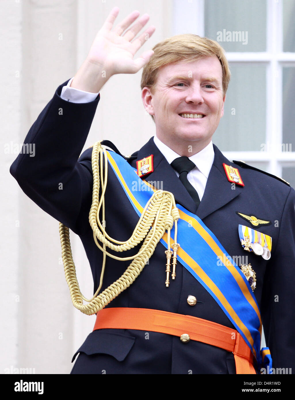 Crown Prince Willem-Alexander of the Netherlands waves from the balcony ...