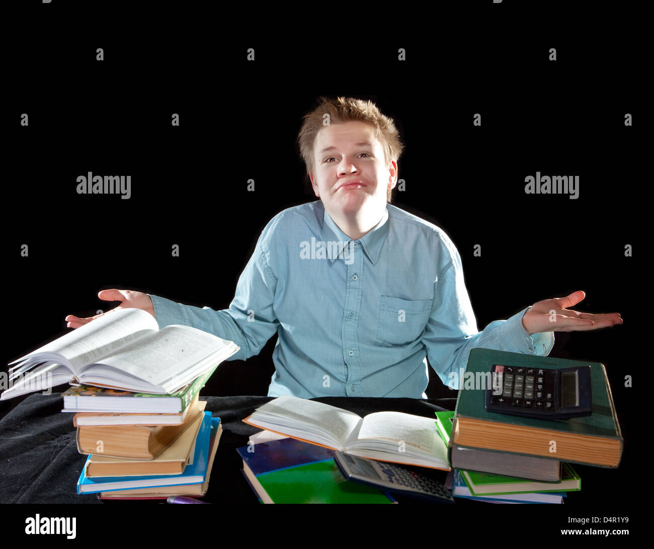 The teenager with a heap of textbooks. Was tired of homework Stock ...