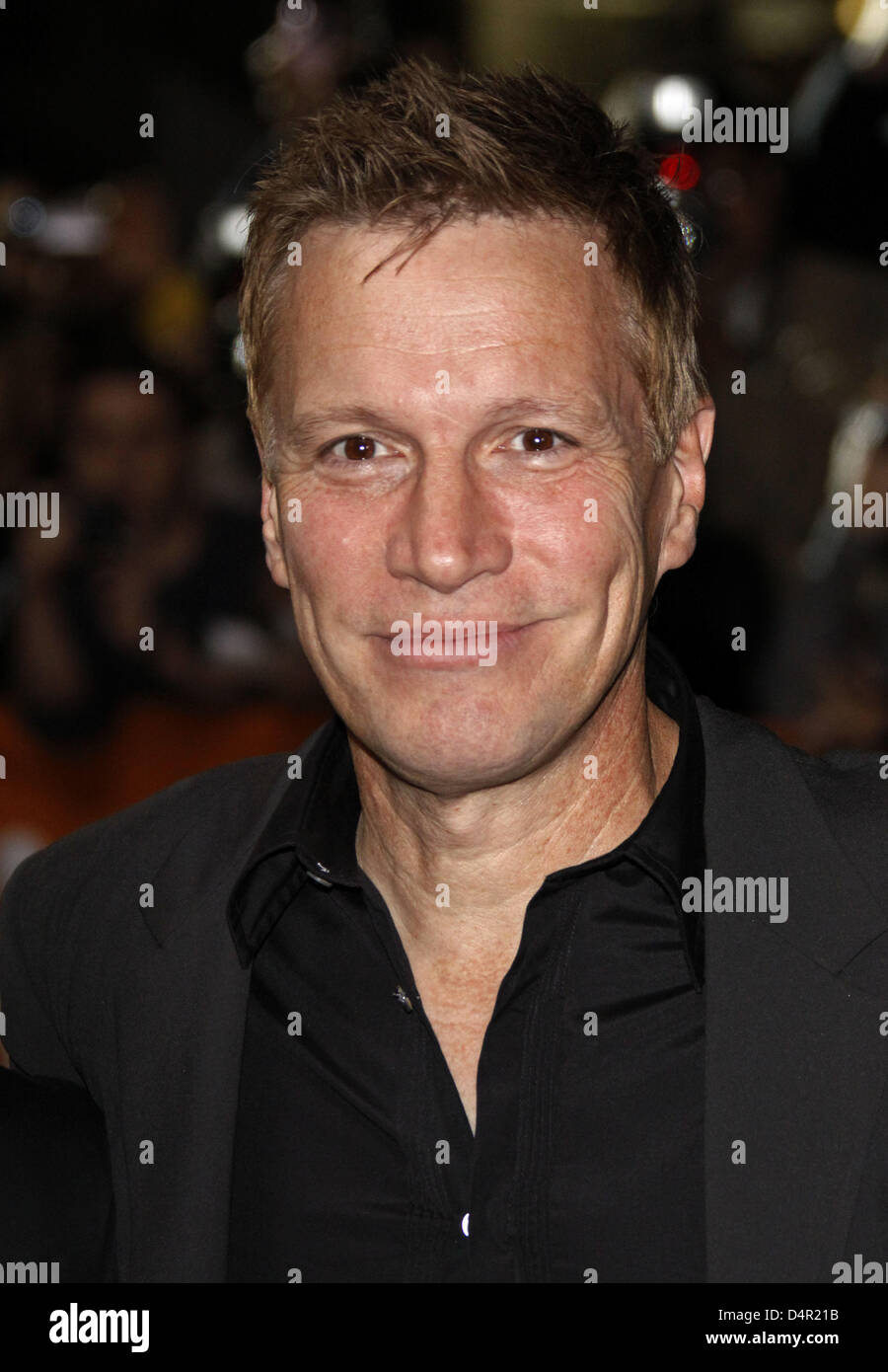 US director Don Roos arrives for the premiere of the film ??Love And ...