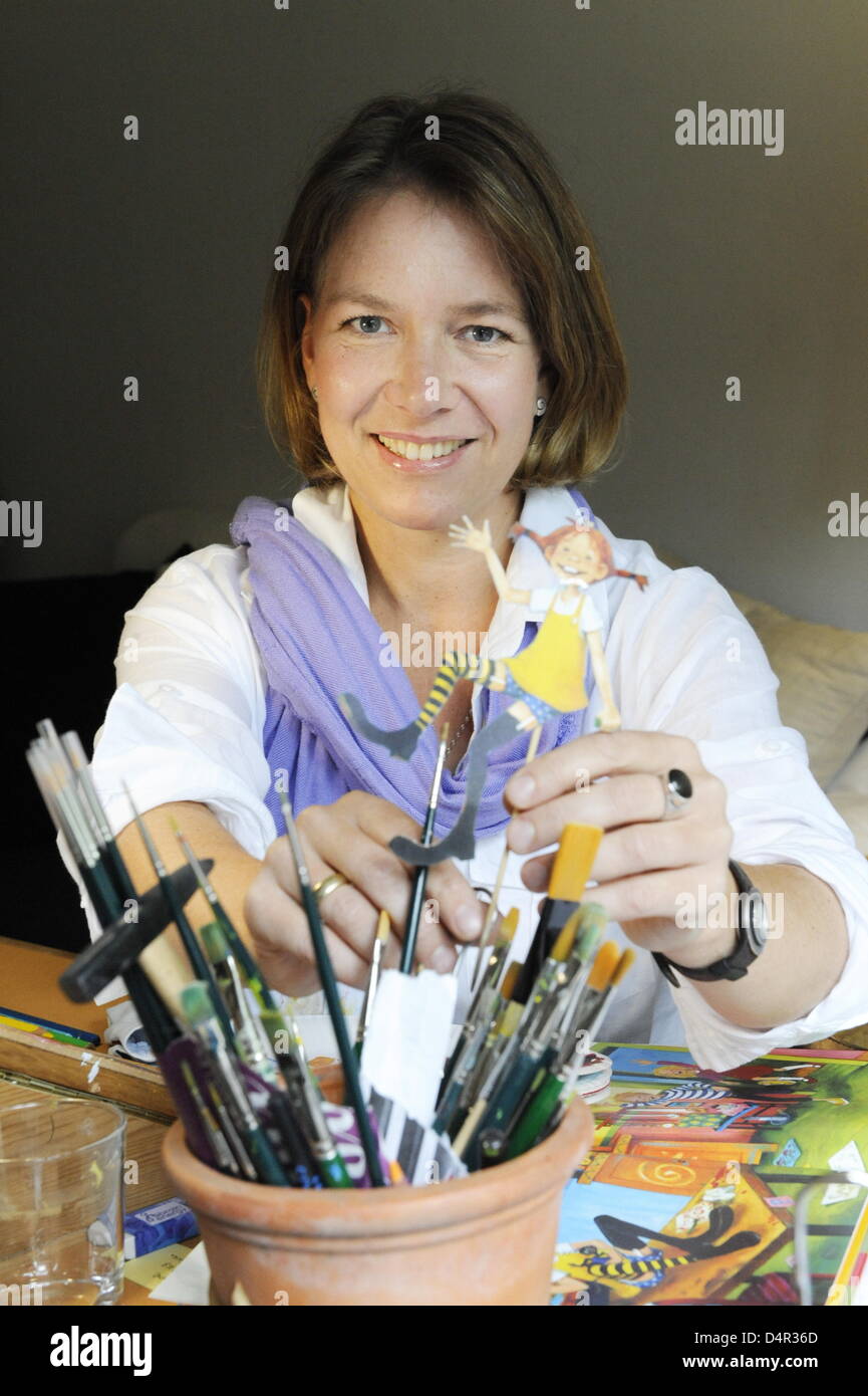 Illustrator Katrin Engelking poses at her desk in Hamburg, Germany, 22 ...