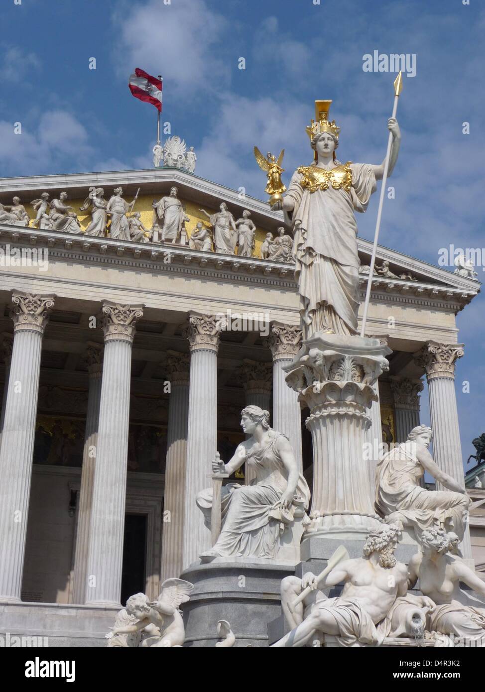 A sculpture of Pallas Athena in front of the parliament in Vienna ...