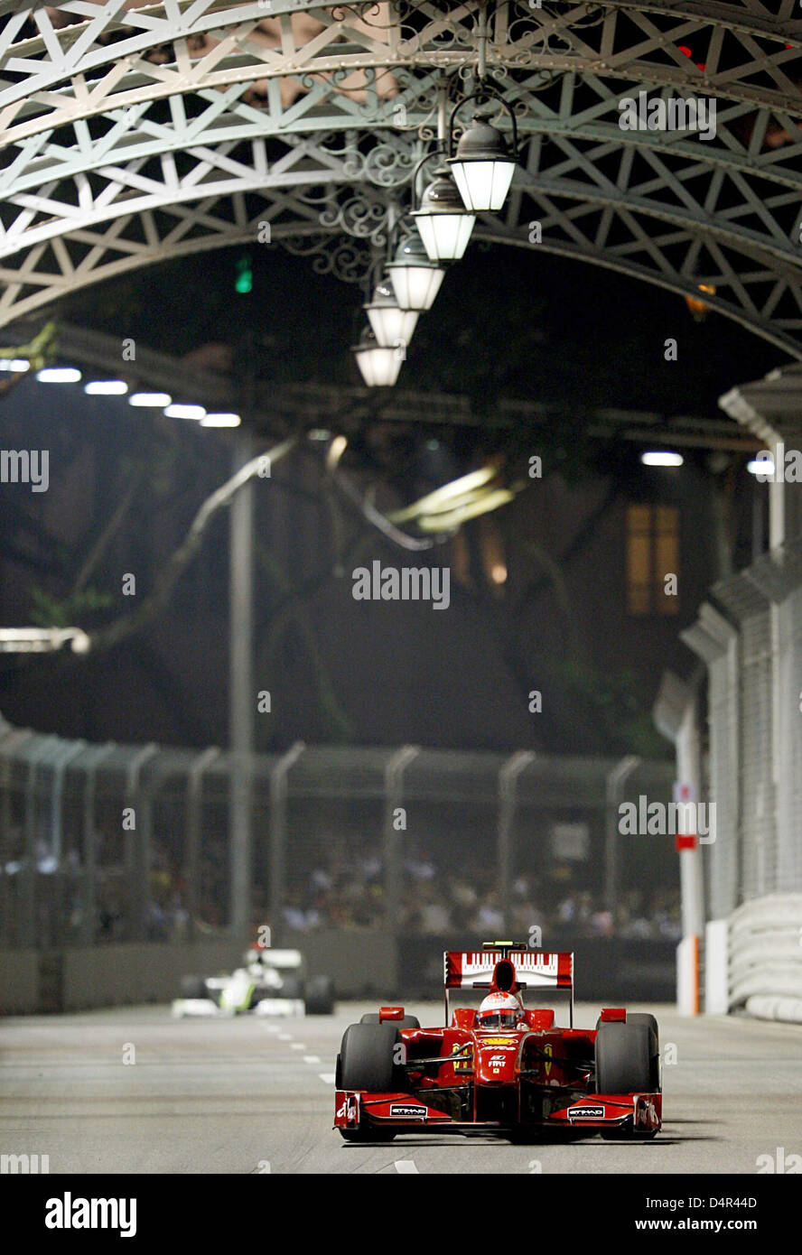 Finnish Formula One driver Kimi Raikkonen of Scuderia Ferrari steers ...