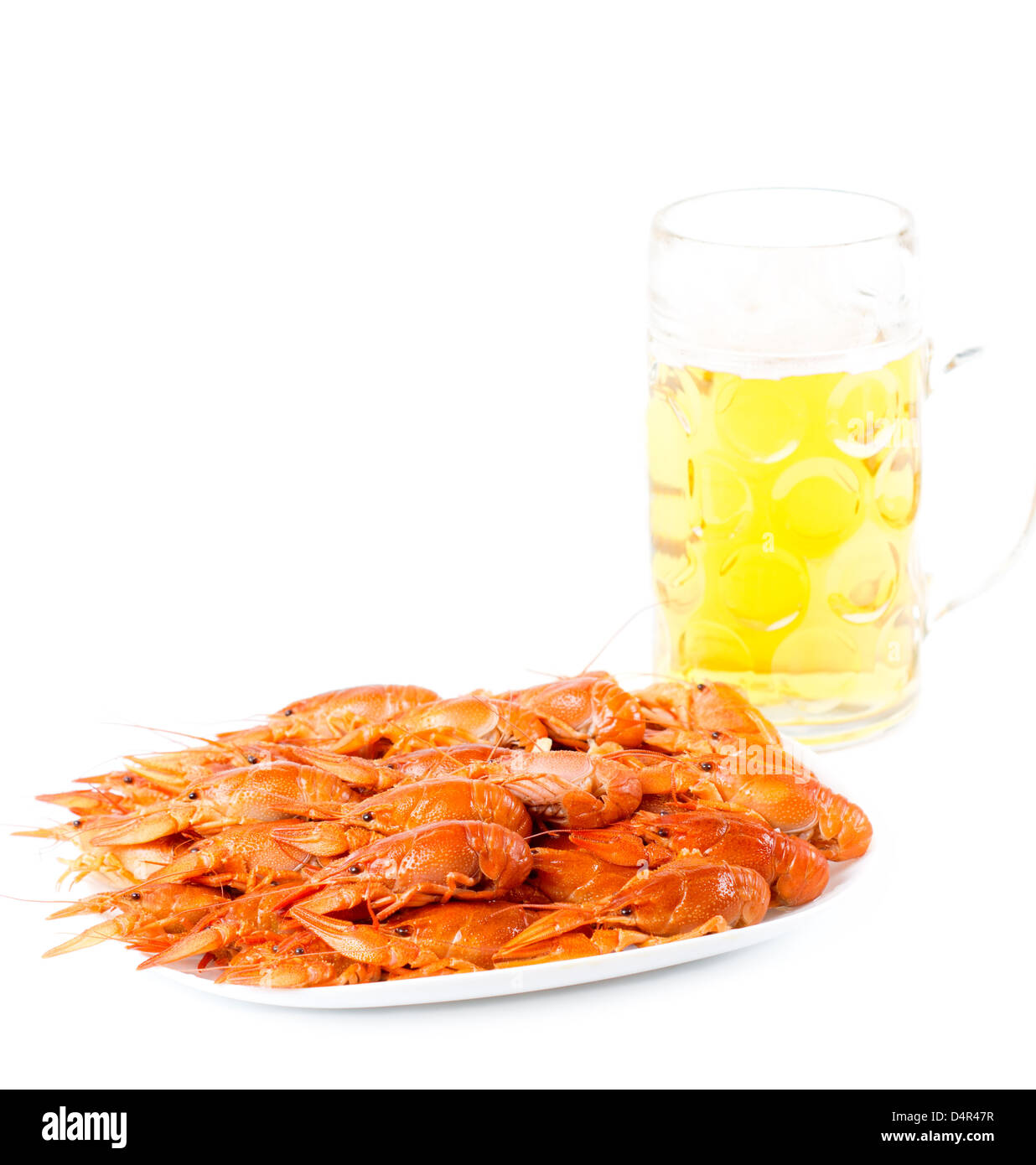 Serving of delicious cooked whole pink prawns on a plate for a gourmet ...