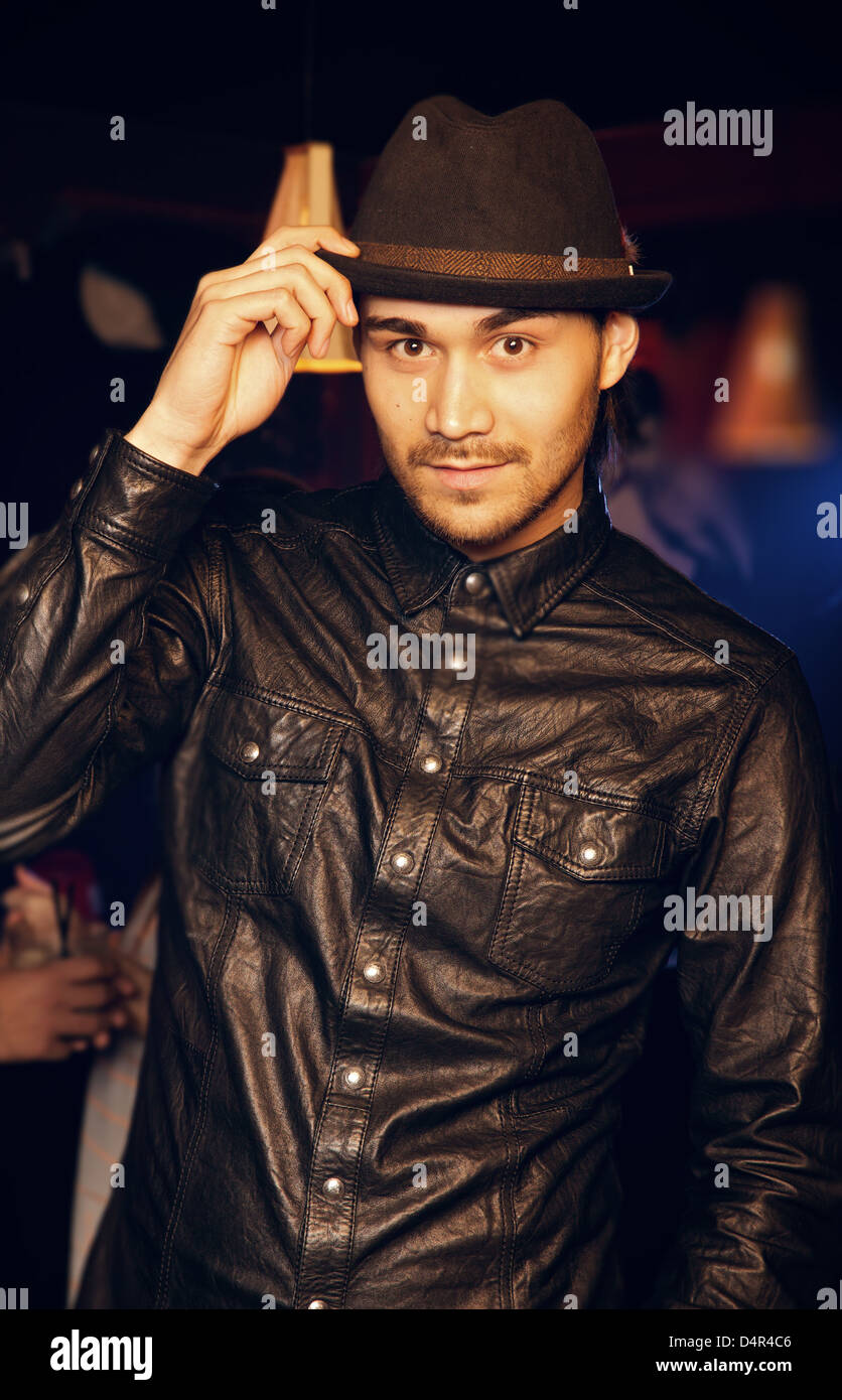 Portrait of a cute dude looking cool in black Stock Photo - Alamy