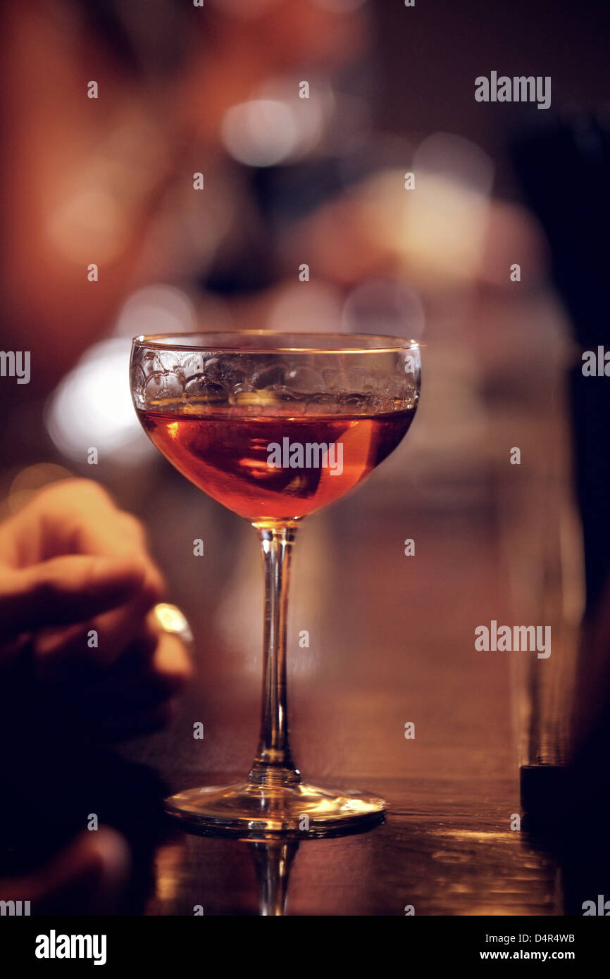 Glass of sparkling red wine on the bar's counter Stock Photo - Alamy