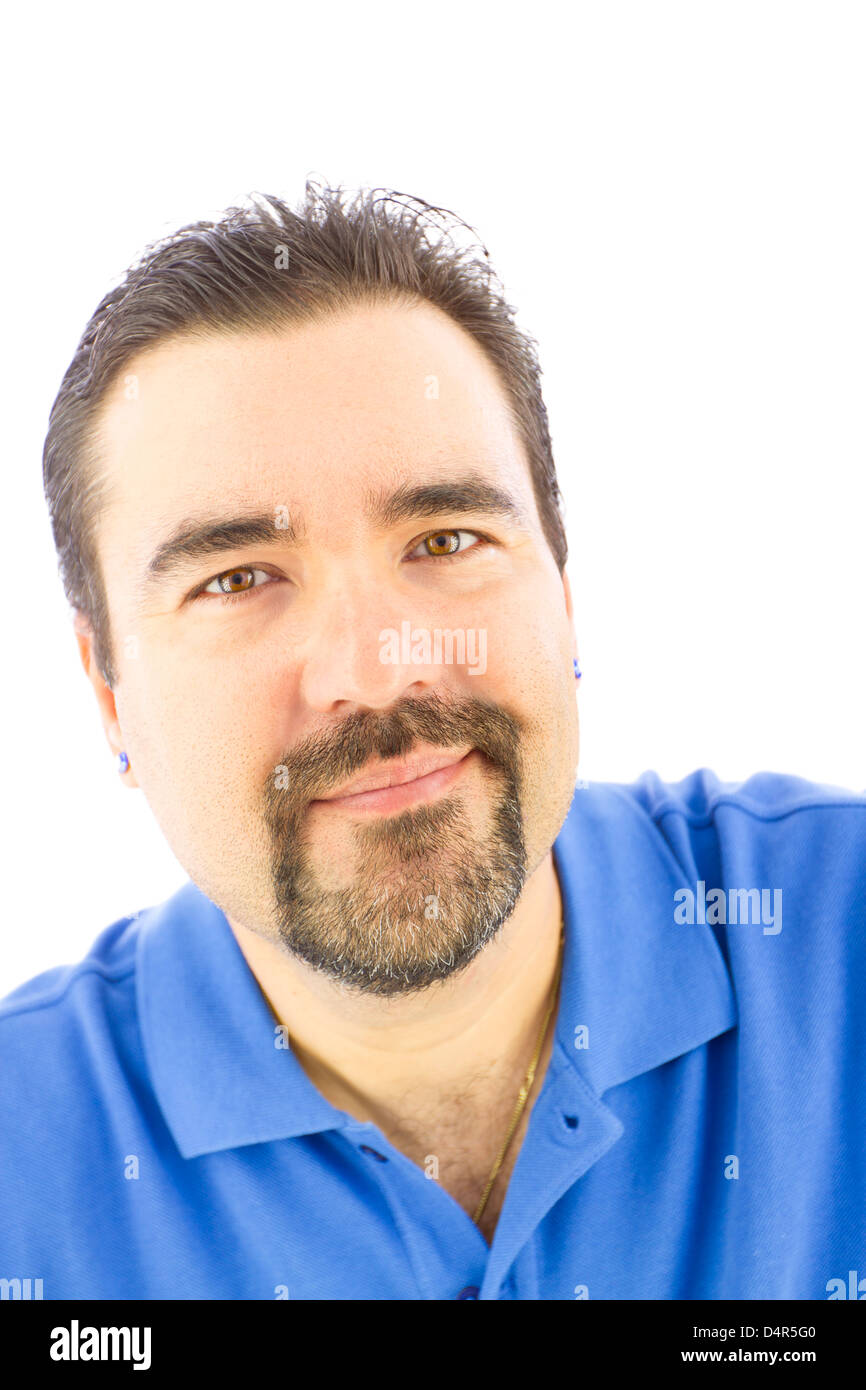 Positively smiling man with goatee and blue shirt Stock Photo - Alamy