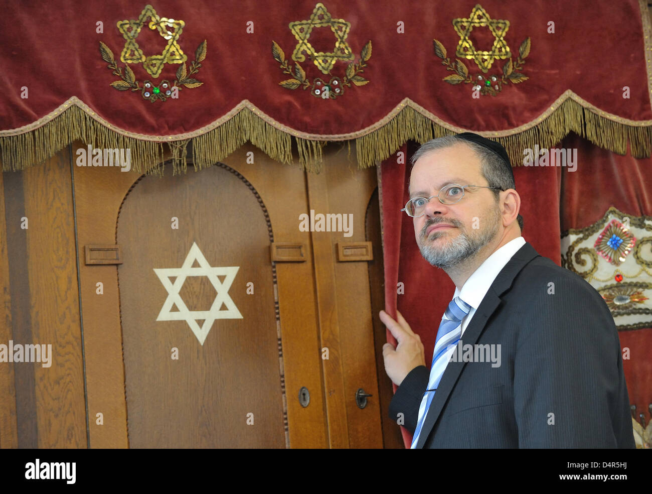 University rabbi Shaul Friberg presents the locker for the Torah prior ...