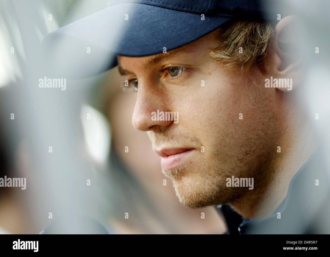 German Formula One driver Sebastian Vettel of Red Bull Racing smiles in ...