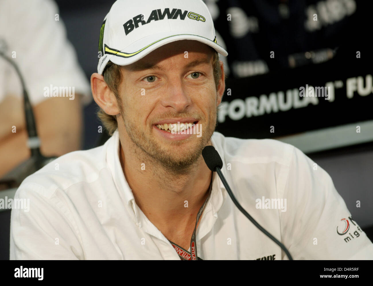 British Formula One driver Jenson Button of Brawn GP smiles during a ...
