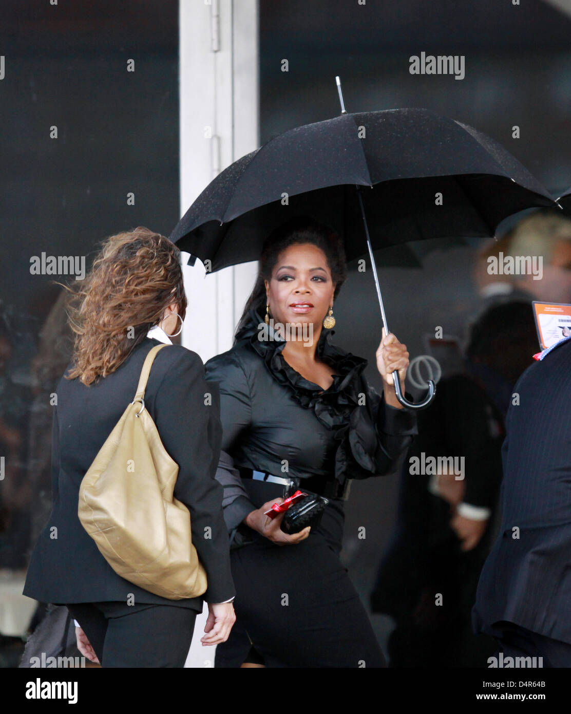 US television producer Oprah Winfrey arrives for the opening ceremony ...