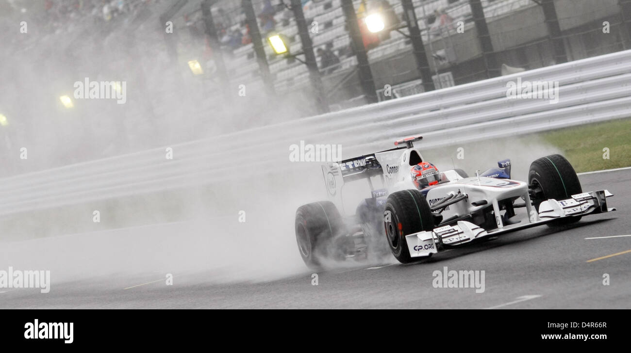 Polish Formula One driver Robert Kubica of BMW Sauber steers his car on ...
