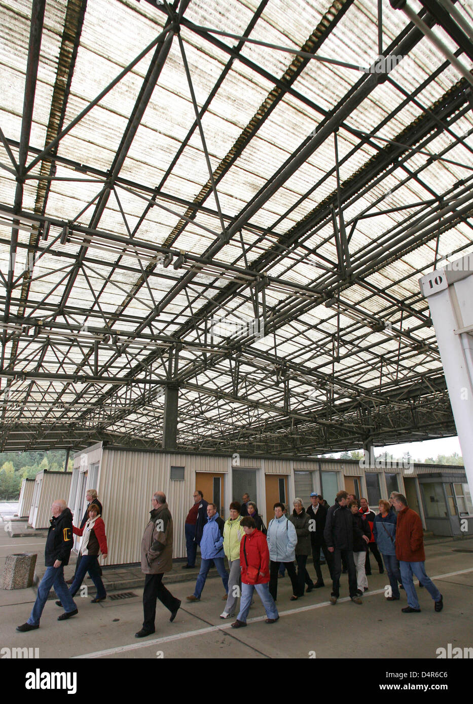 Visitors of division of Germany memorial Marienborn walk through the ...