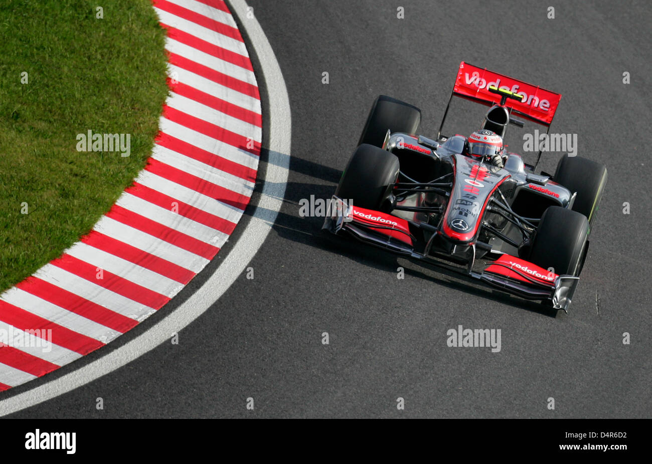 Finnish Formula One driver Heikki Kovalainen of McLaren Mercedes comes ...