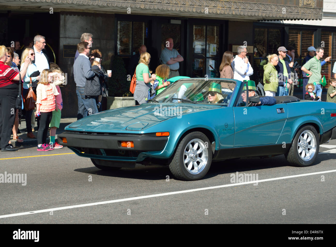 Classic English Triumph convertible participating in St. Patrick's Day ...