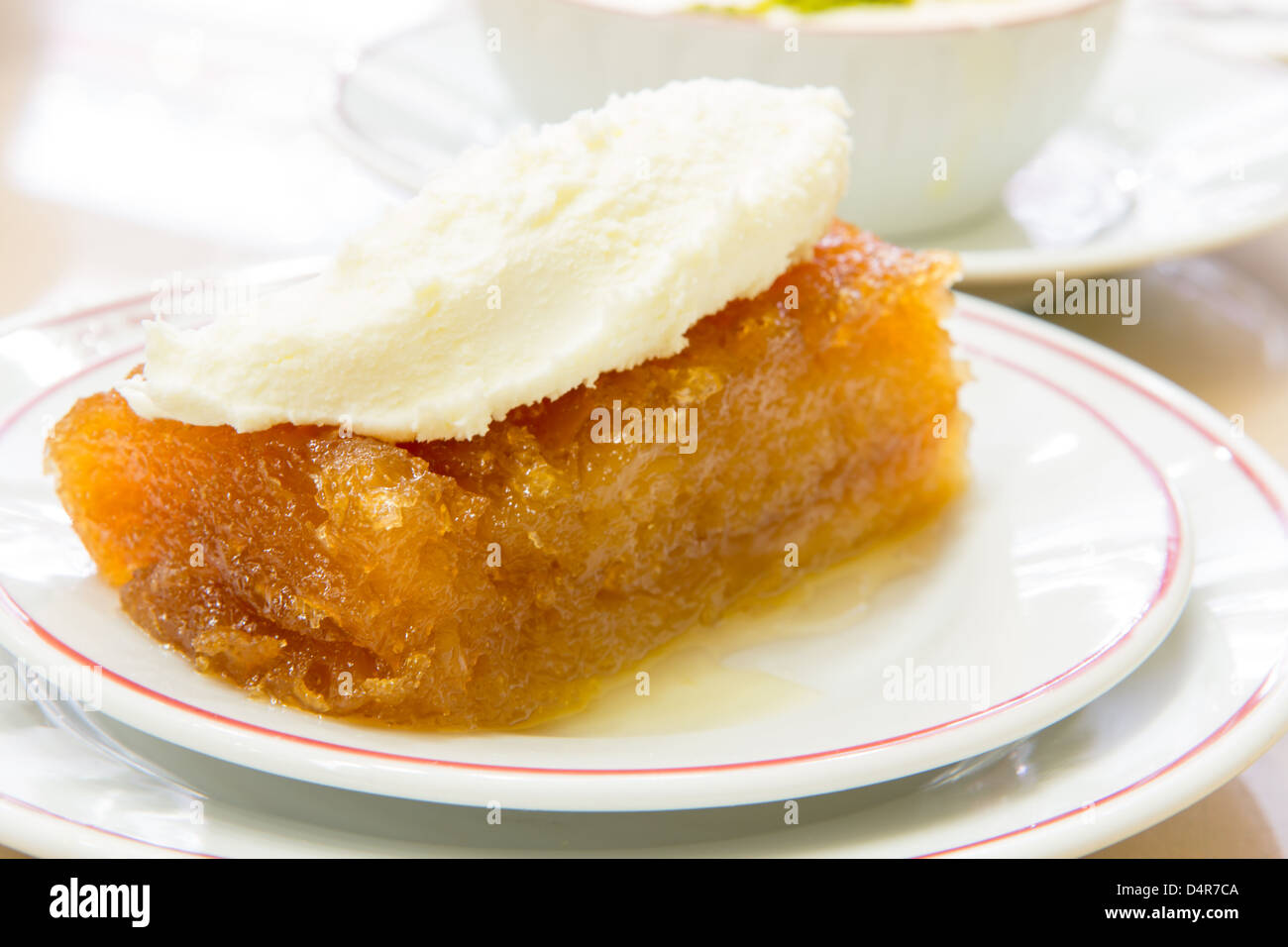 Traditional Turkish dessert Ekmek Tatlisi made with bread and sherbet ...
