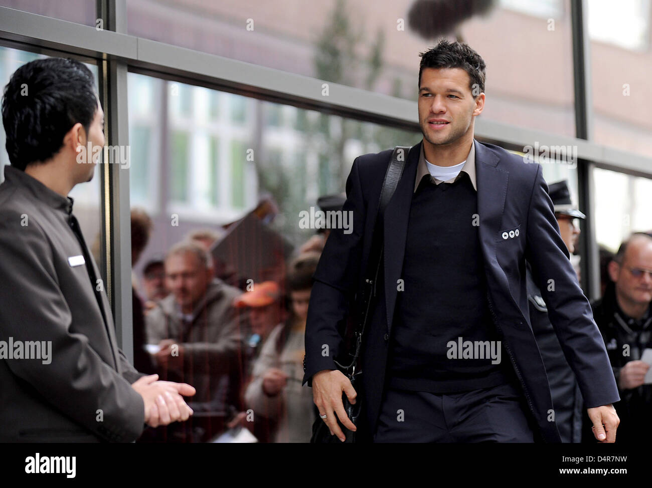 German national soccer player Michael Ballack enters a hotel in Hamburg ...