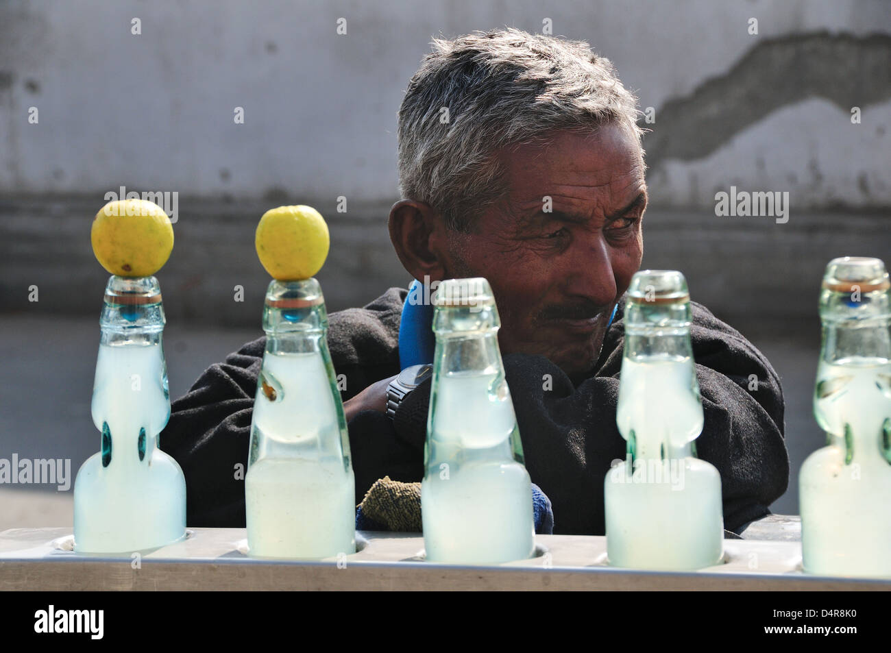 The man selling local made drink on the street Stock Photo - Alamy