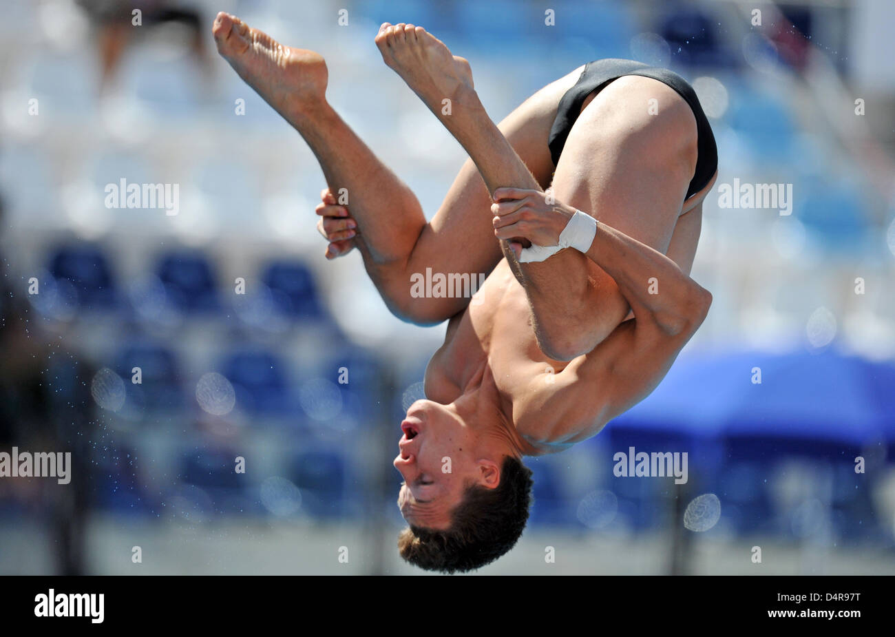Germany?s Patrick Hausding dives off the 3m springboard during the 3m ...