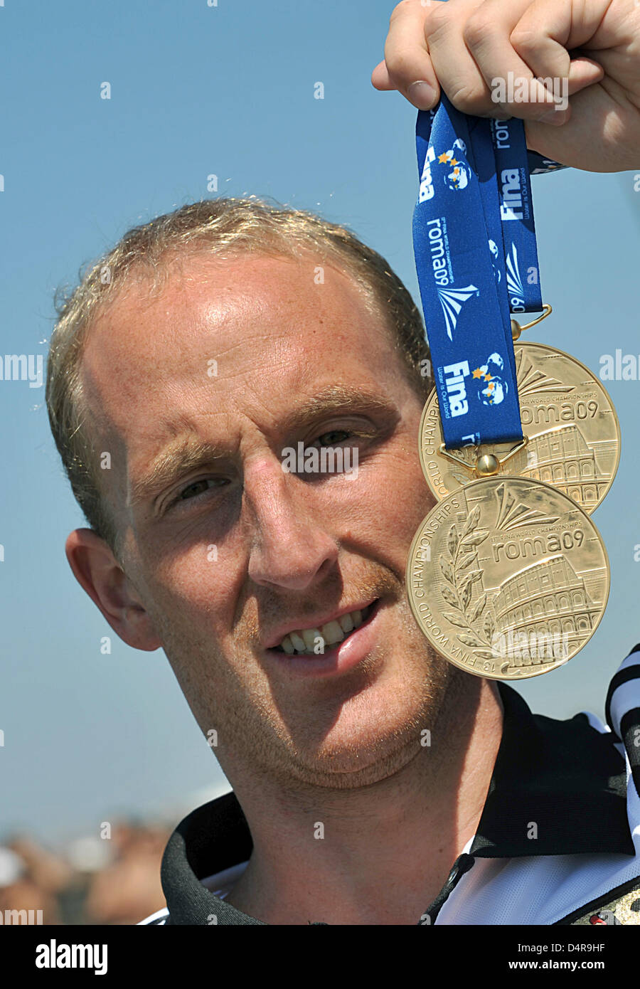 German open water swimmer Thomas Lurz poses with his two gold medals in ...