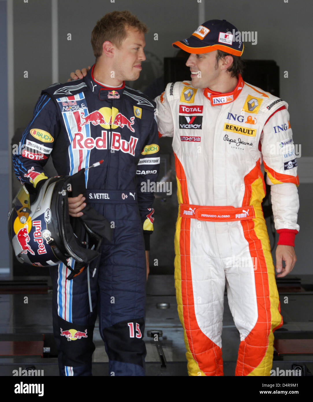 Spanish Formula One driver Fernando Alonso of Renault F1 (R), who ...