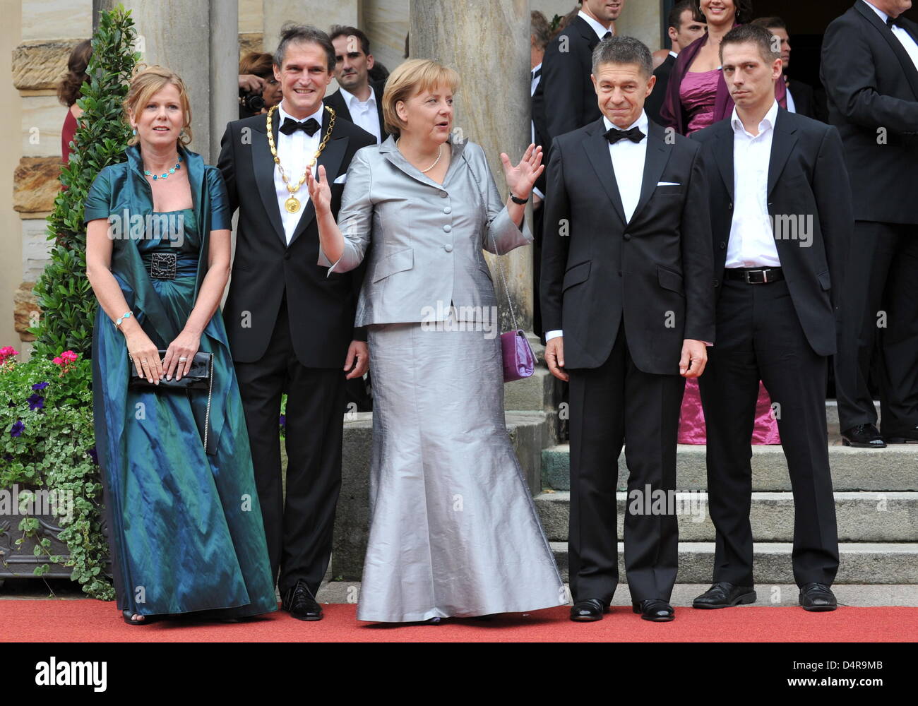 Michael Hohl (2-L), mayor of Bayreuth, and his wife Hannelore (L) and ...