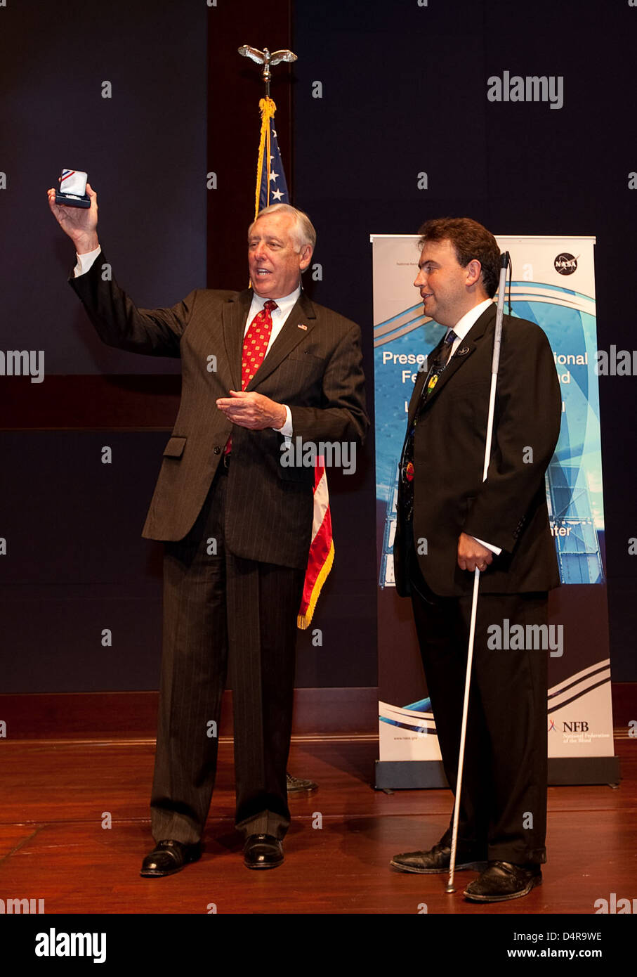 A Braille coin, presented by the National Federation of the Blind ...