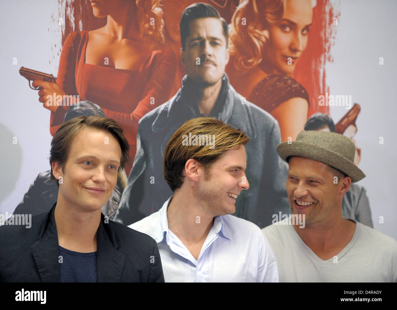 German actors August Diehl (L-R), Daniel Bruehl and Til Schweiger pose ...
