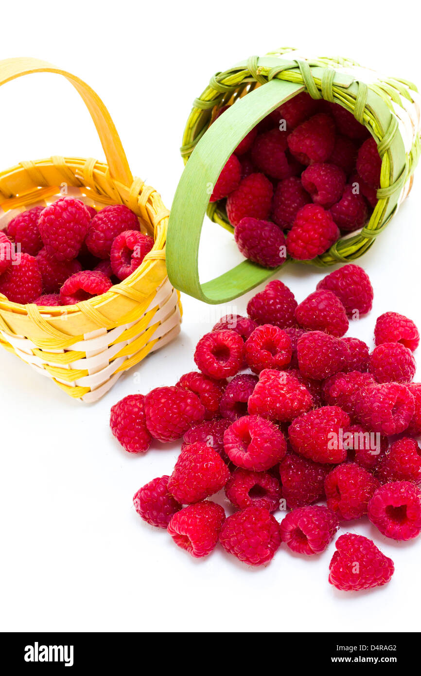 Heap of organic raspberries on white background Stock Photo - Alamy
