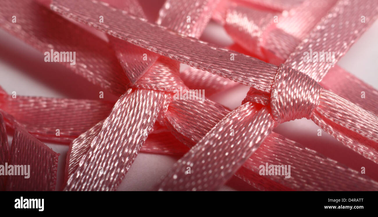 Mini pink ribbons for crafting Stock Photo - Alamy