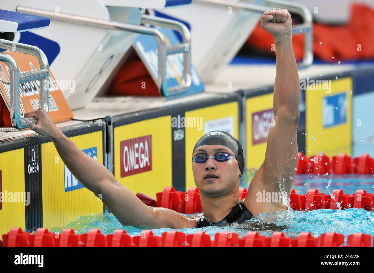 Chinese swimmer Lin Zhang jubilates after winning the men?s 800m ...