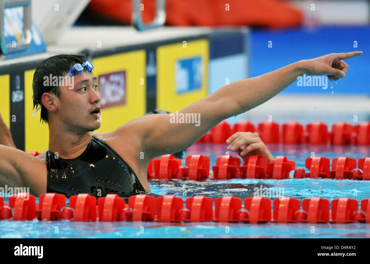 Chinese swimmer Lin Zhang jubilates after winning the men?s 800m ...