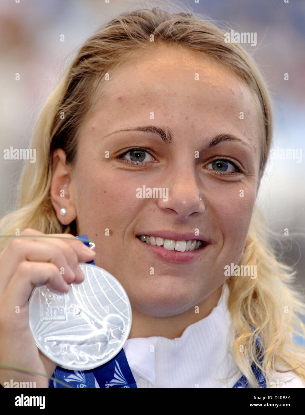 German swimmer Daniela Samulski shows her silver medal after the final ...